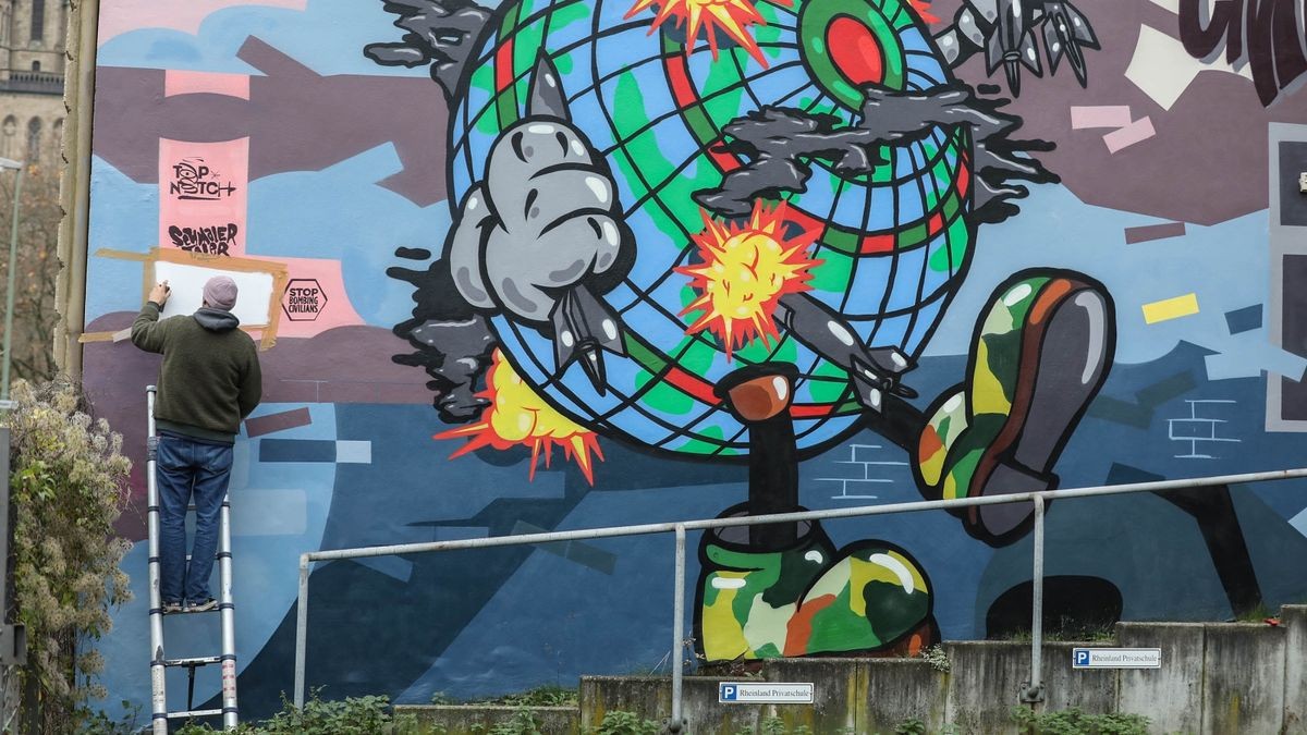 Knallbuntes Wandgemälde soll Menschen aufrütteln